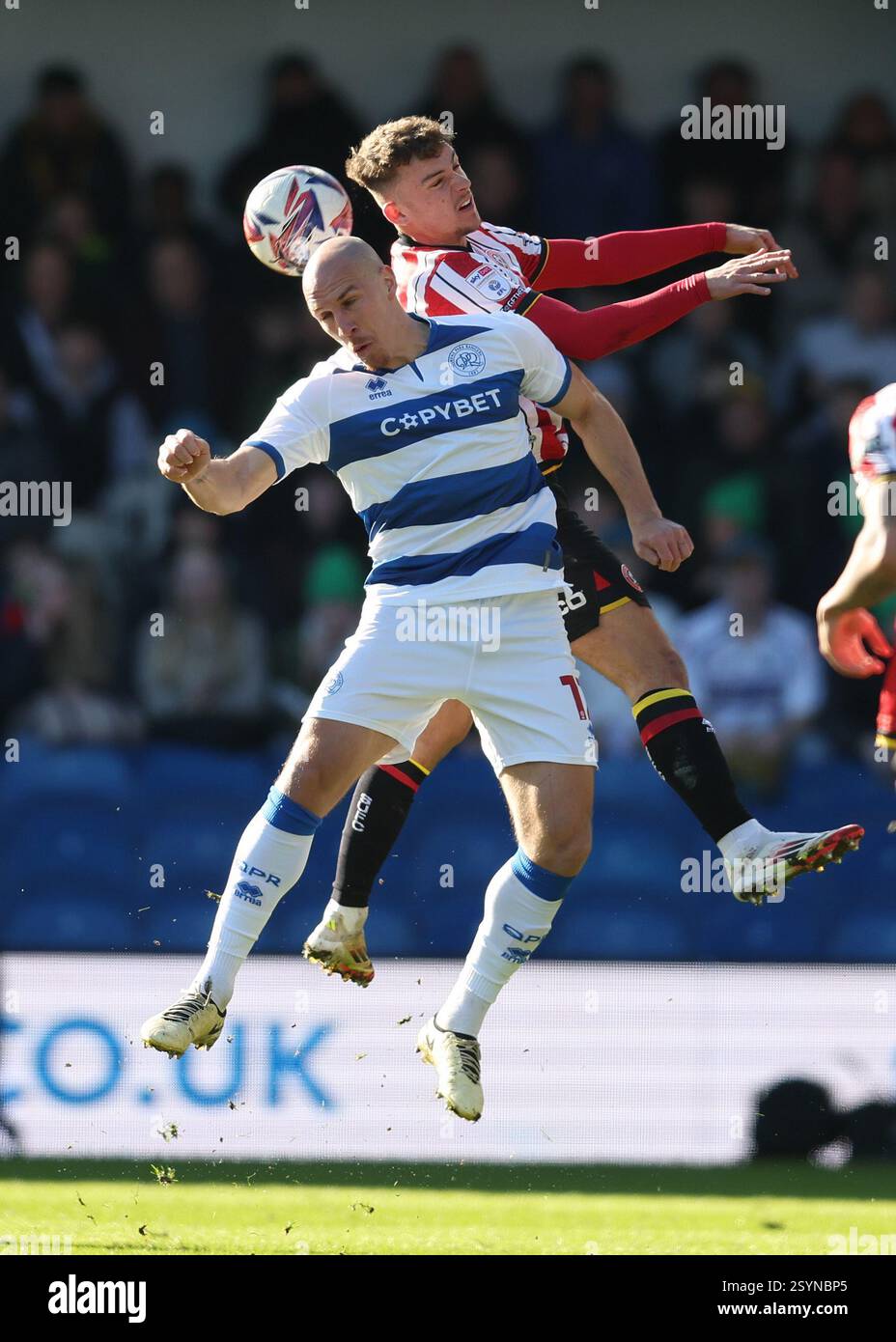 London, UK. 1st Mar, 2025. Michael Frey of QPR challenges Harrison ...