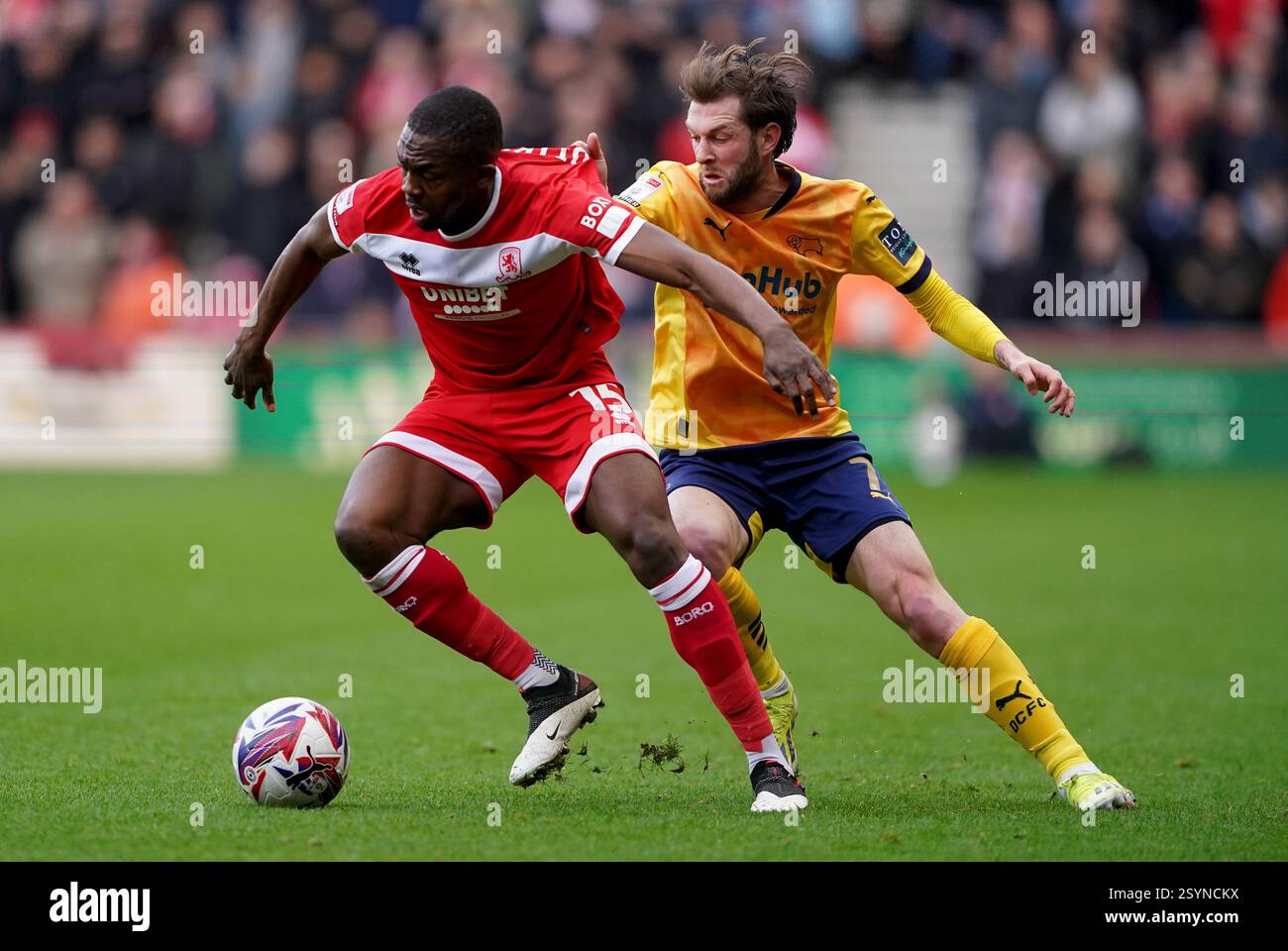 Middlesbrough's Anfernee Dijksteel (left) and Derby County's Tom ...