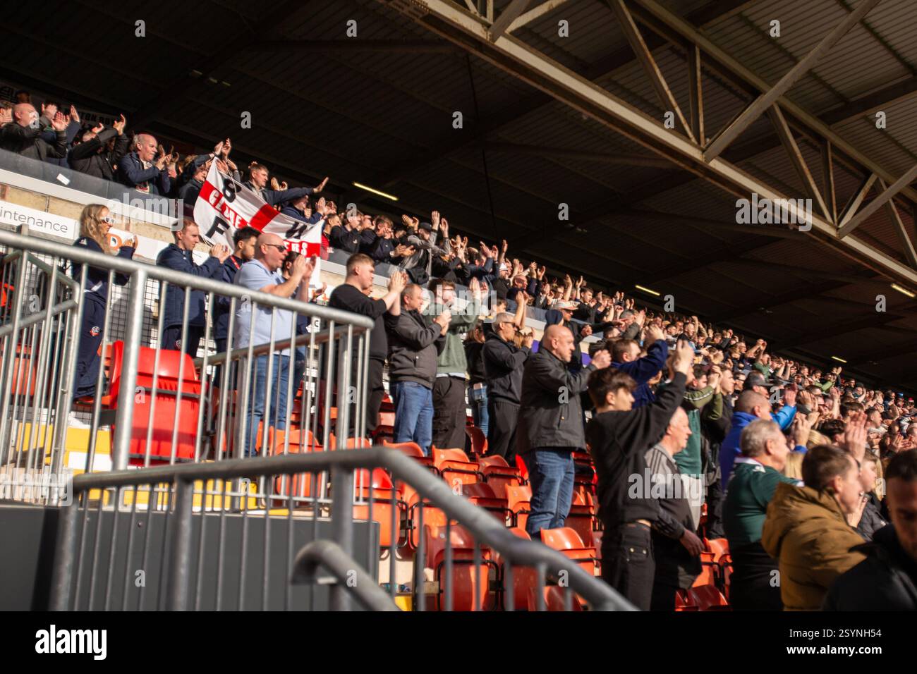 Bolton fans celebrate the draw at full time following the Sky Bet ...