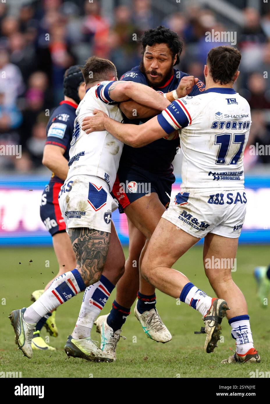 St Helens' Agnatius Paasi is tackled during the Betfred Super League ...