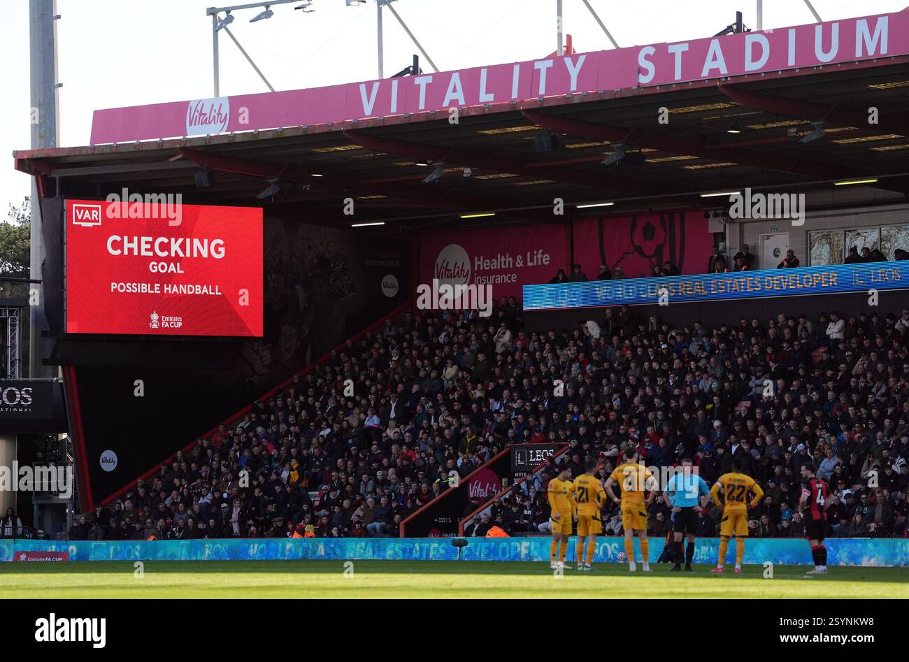Referee Sam Barrott waits on the VAR decision before they rule out a ...