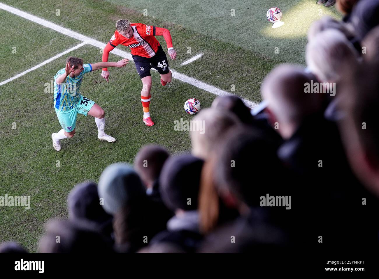 Luton Town's Alfie Doughty (right) and Portsmouth's Matt Ritchie battle ...