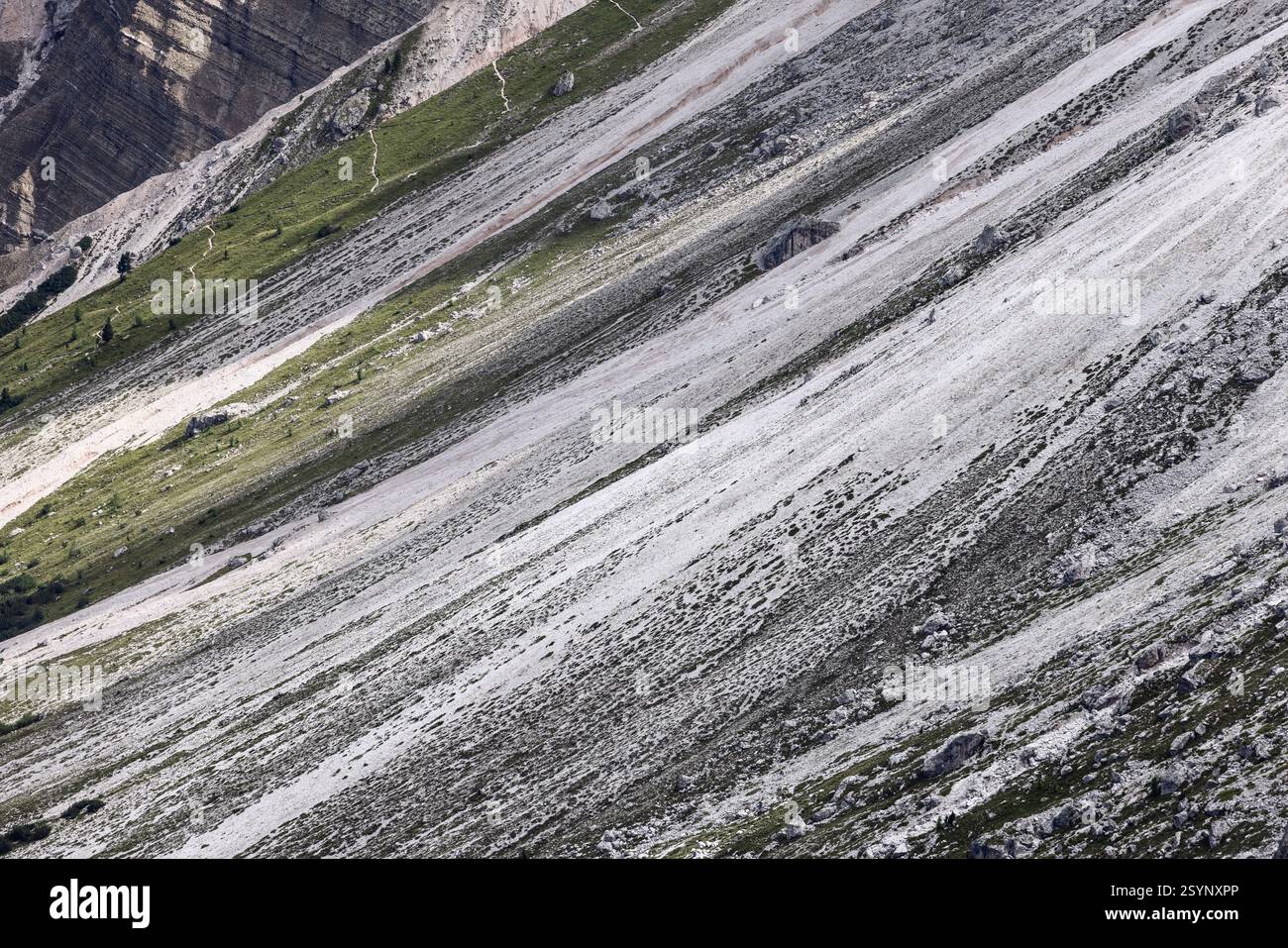 A detailed view of the textured mountain slope in the Dolomites, Italy ...