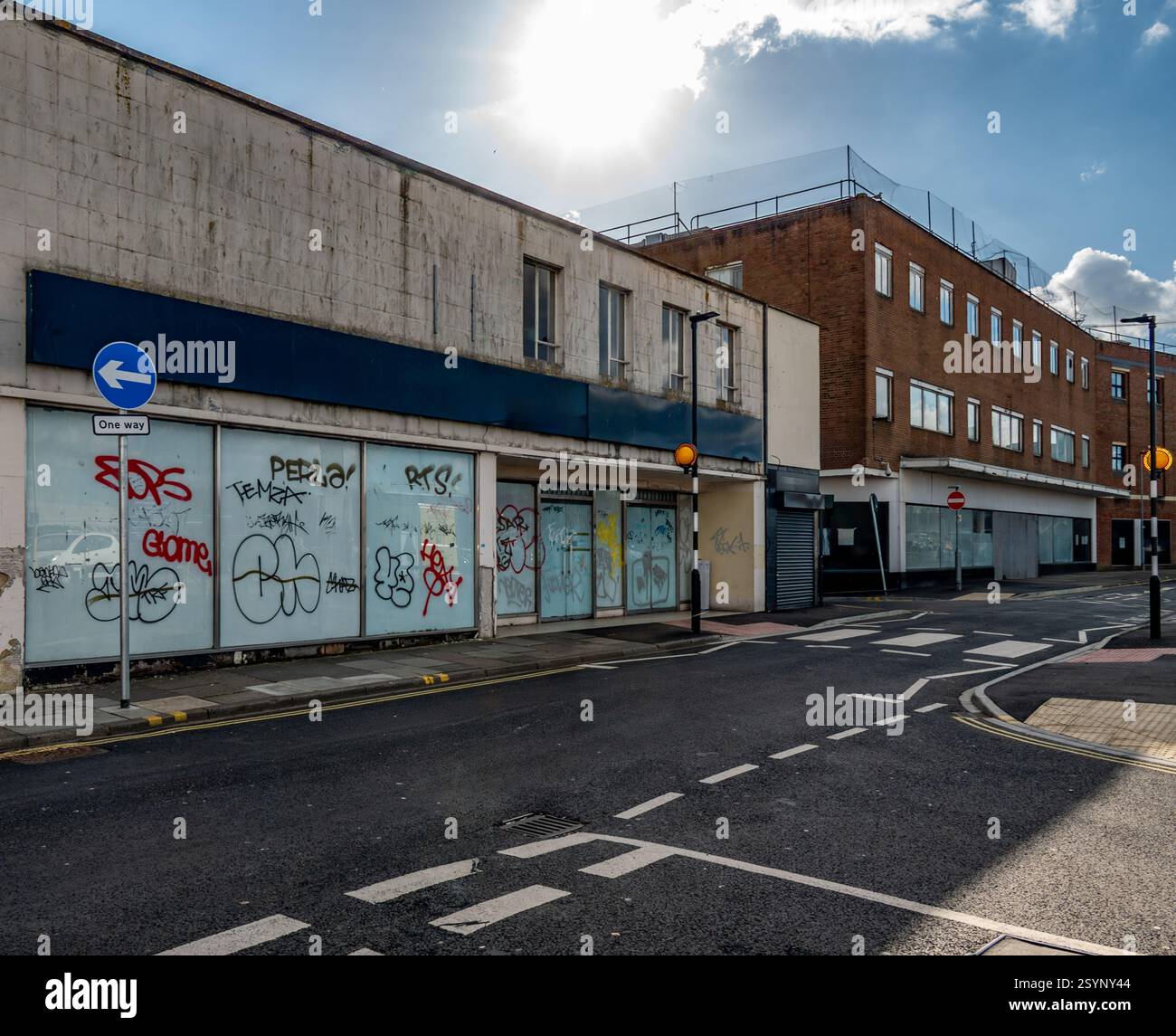 Closed and empty shops in a UK shopping centre portraying the downturn ...