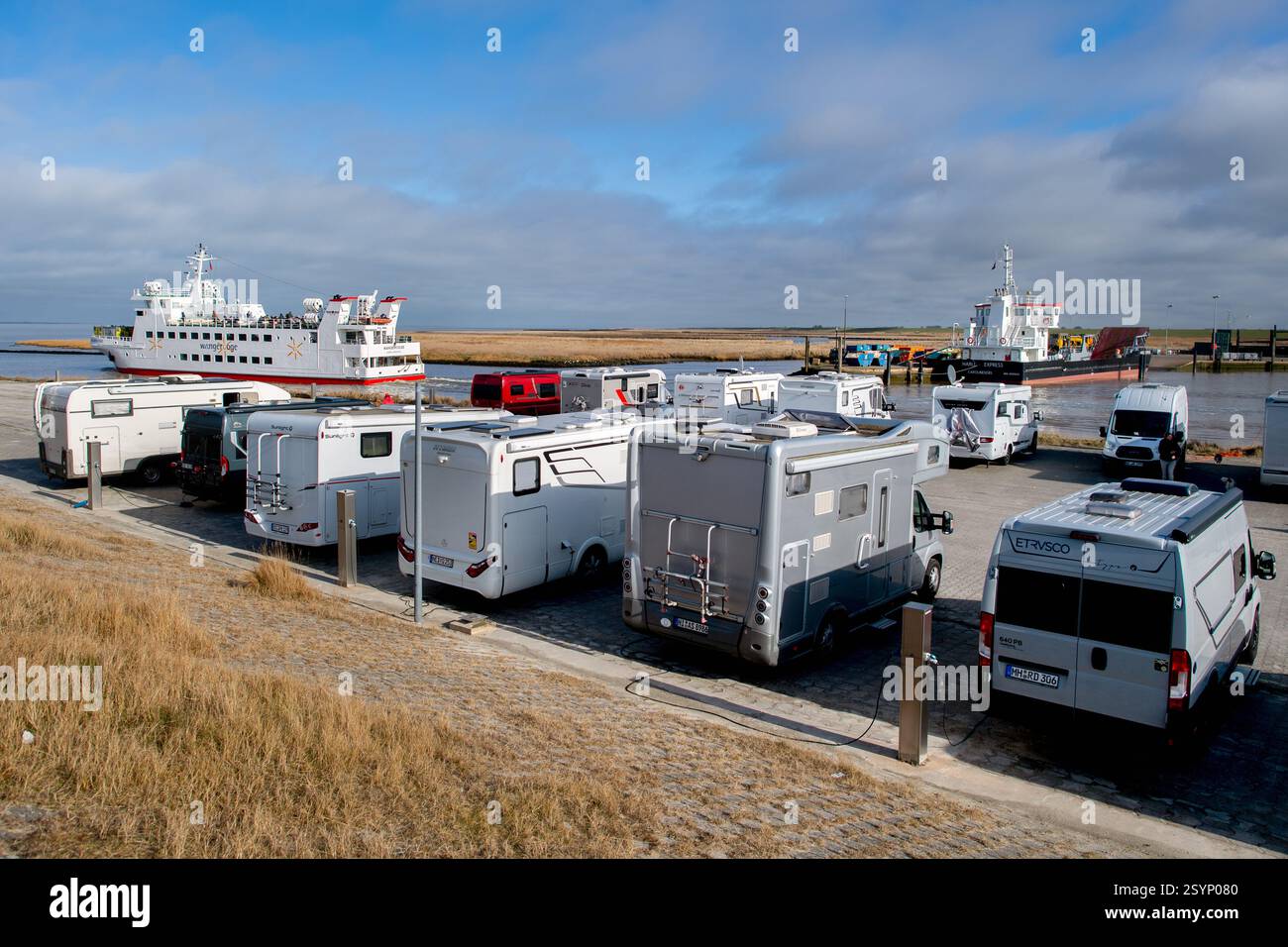 01 March 2025, Lower Saxony, Harlesiel: Numerous motorhomes stand on a ...