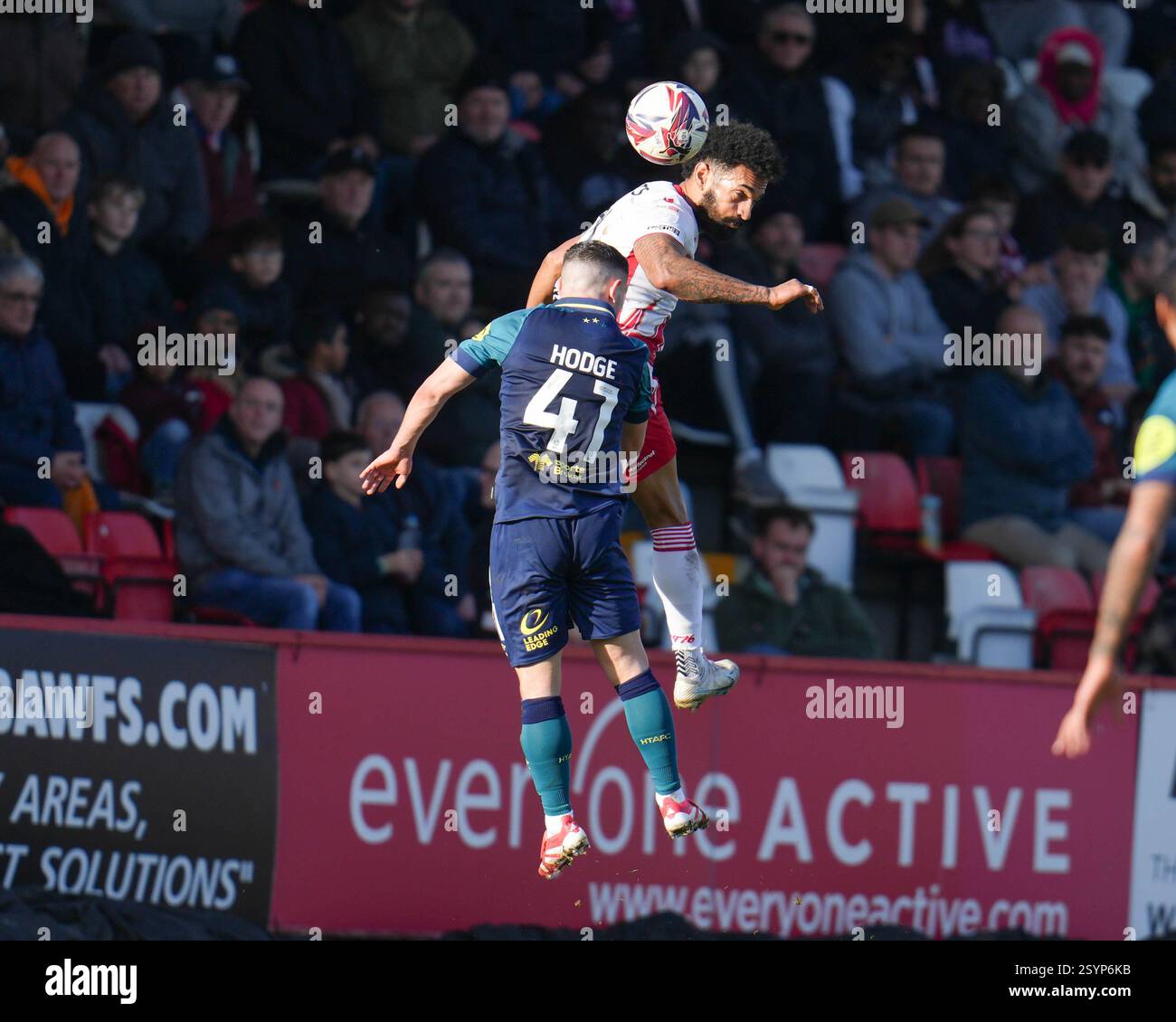 Jordan Roberts of Stevenage wins header against Joe Hodge of ...