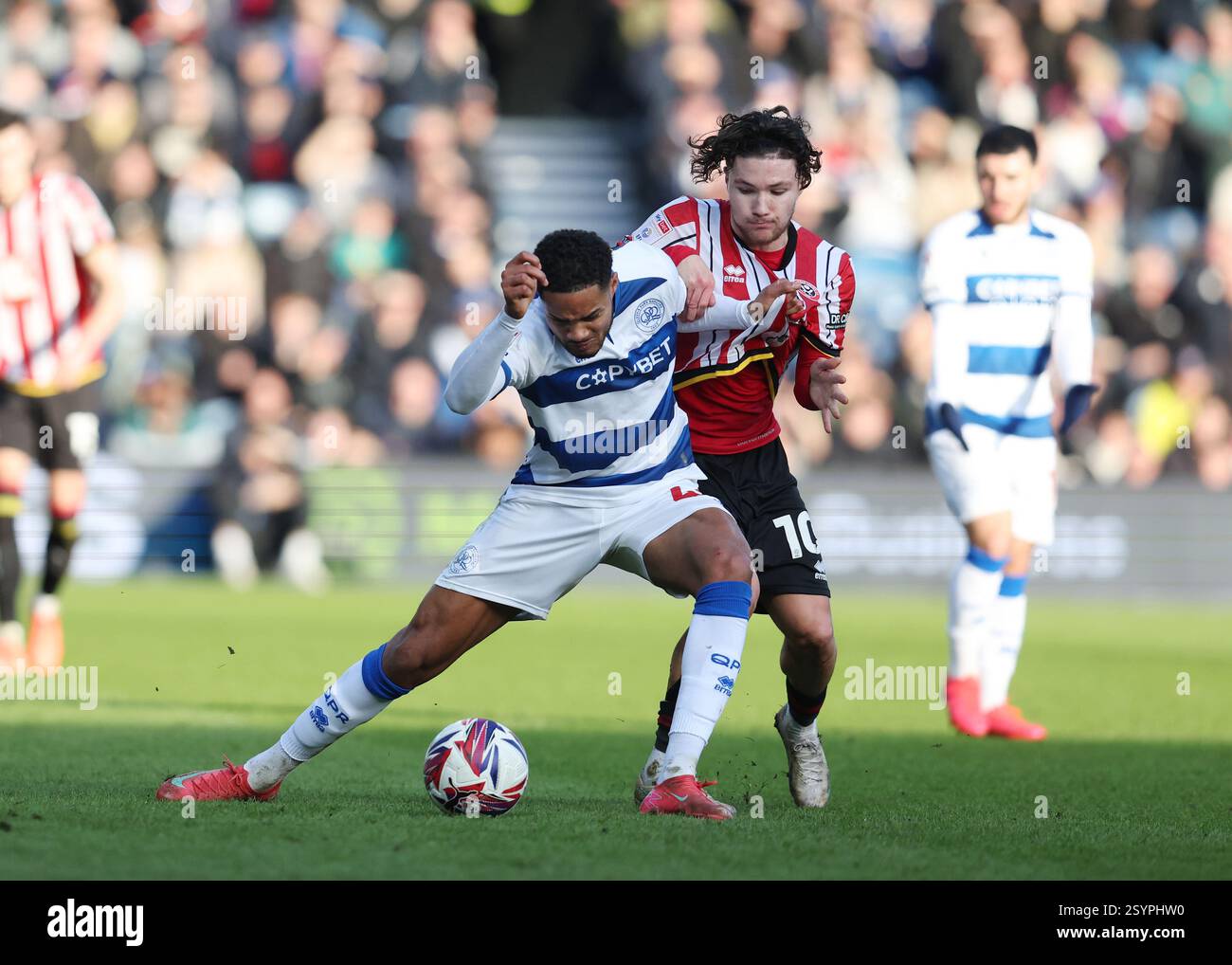 London, UK. 1st Mar, 2025. Jonathan Varane of QPR tussles with Callum O ...
