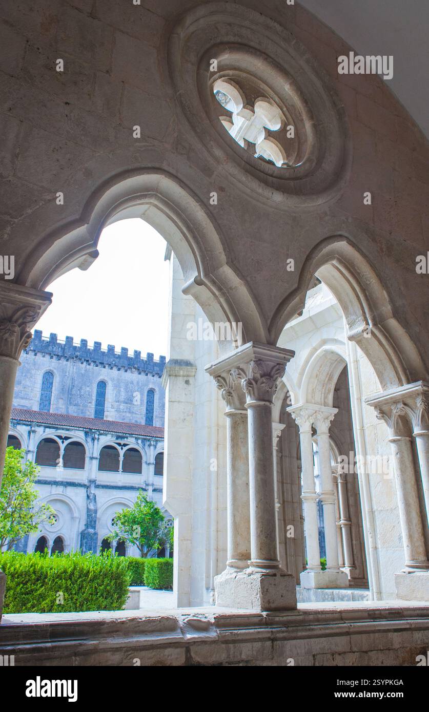 a picturesque view through a series of arched windows within a historic ...