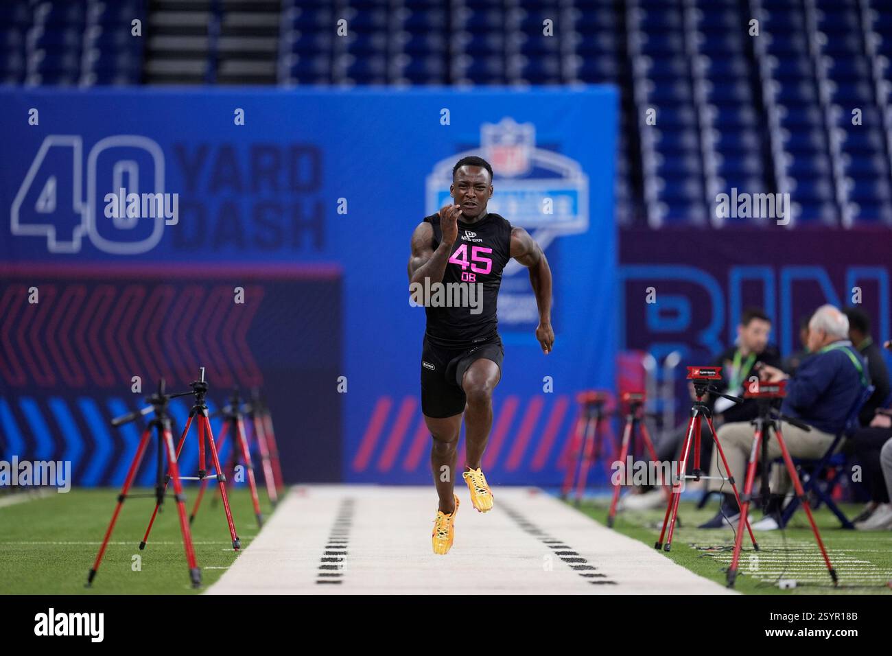 Texas defensive back Andrew Mukuba runs the 40-yard dash at the NFL ...