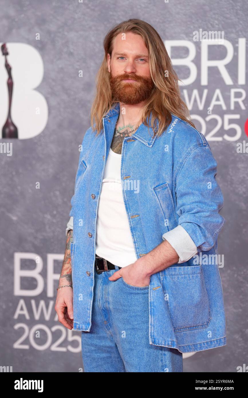 Sam Ryder poses for photographers upon arrival at the Brit Awards 2025 ...