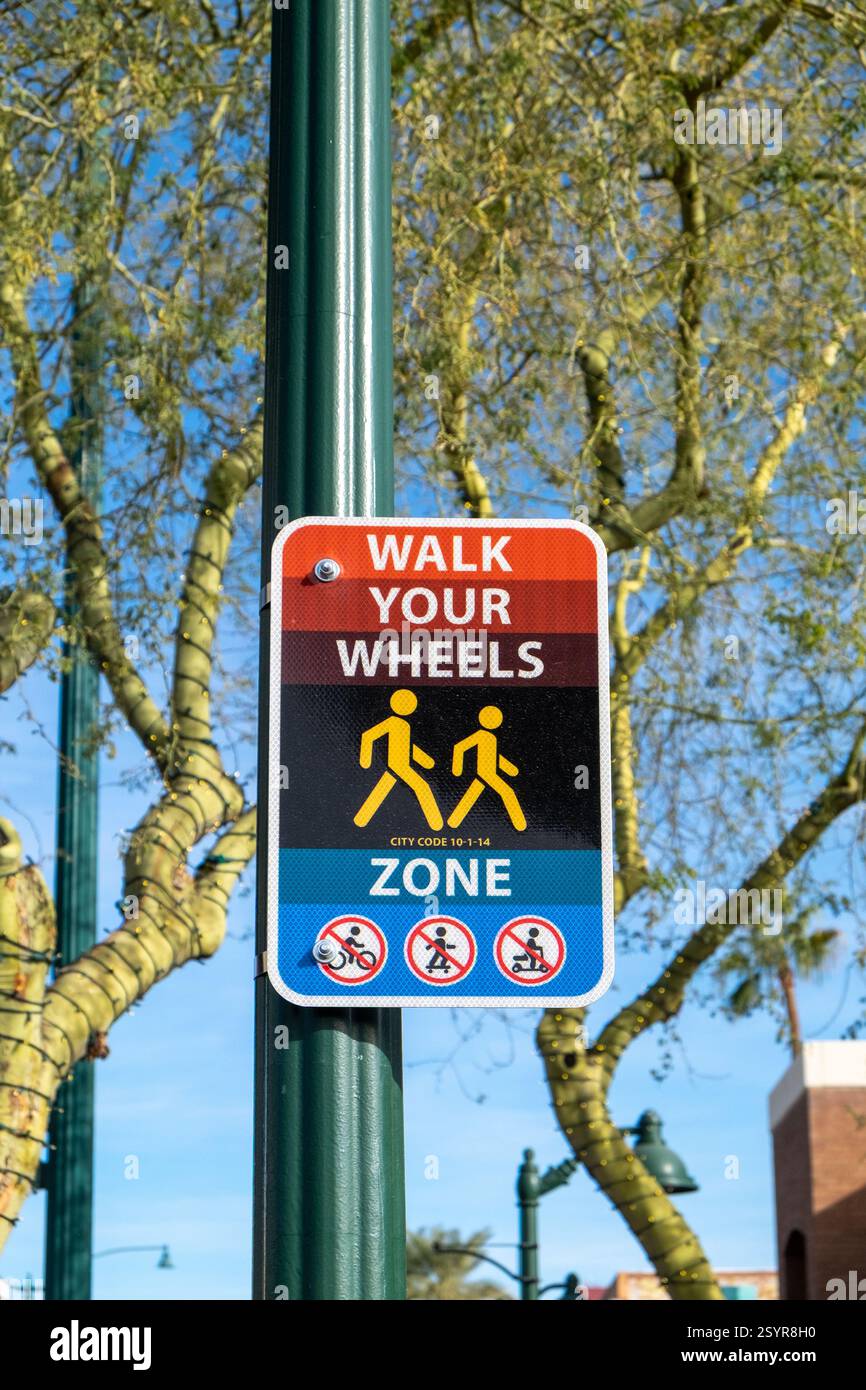 Pedestrian only zone sign showing walk your wheels in Phoenix, Arizona ...