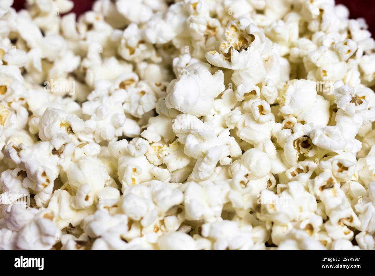 Delicious portion of movie theater popcorn ready to eat Stock Photo - Alamy