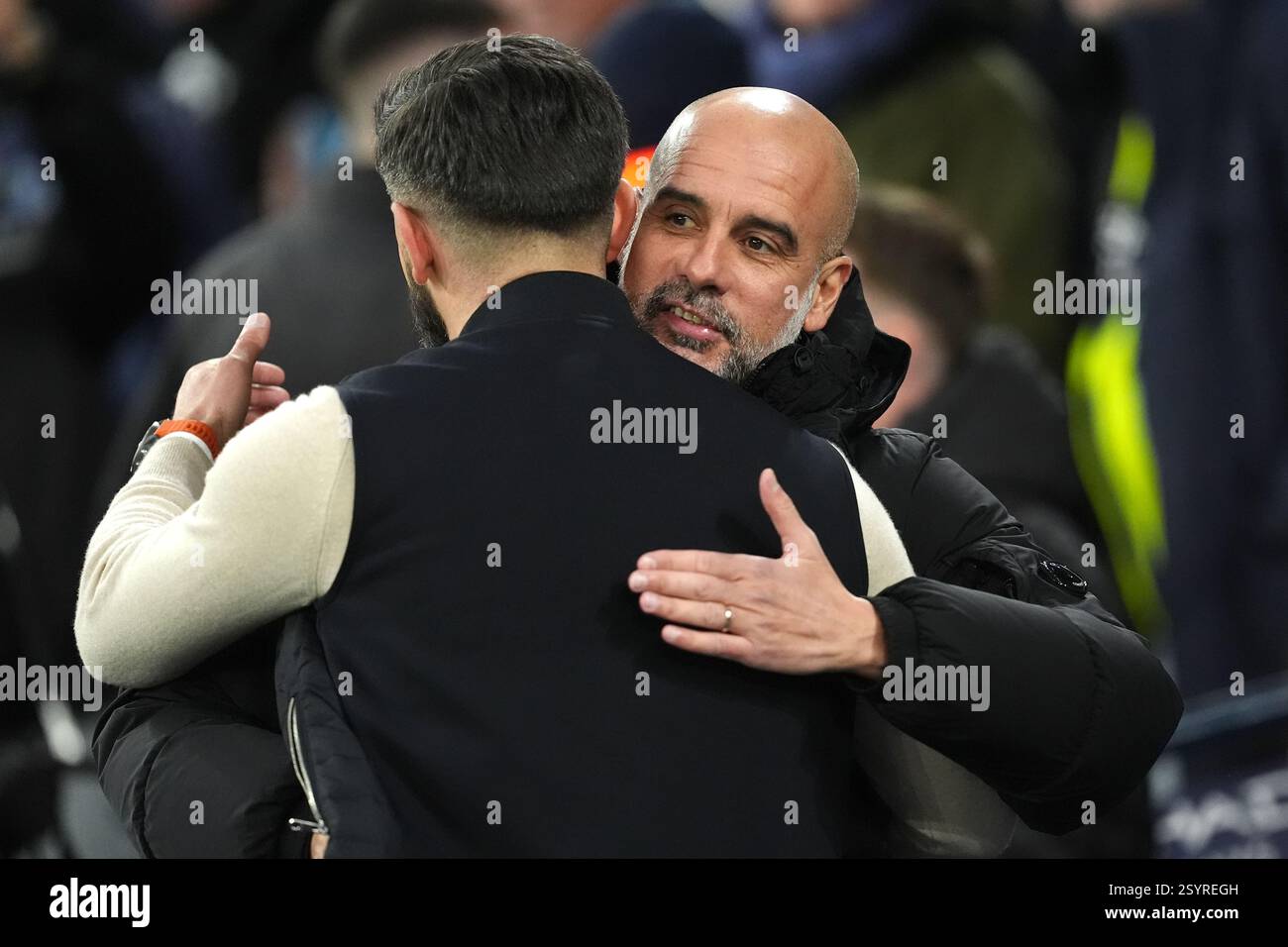 Manchester City manager Pep Guardiola (right) and Plymouth Argyle ...