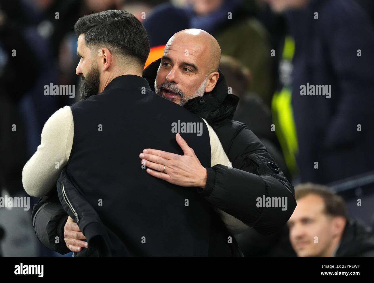 Manchester City manager Pep Guardiola (right) and Plymouth Argyle ...