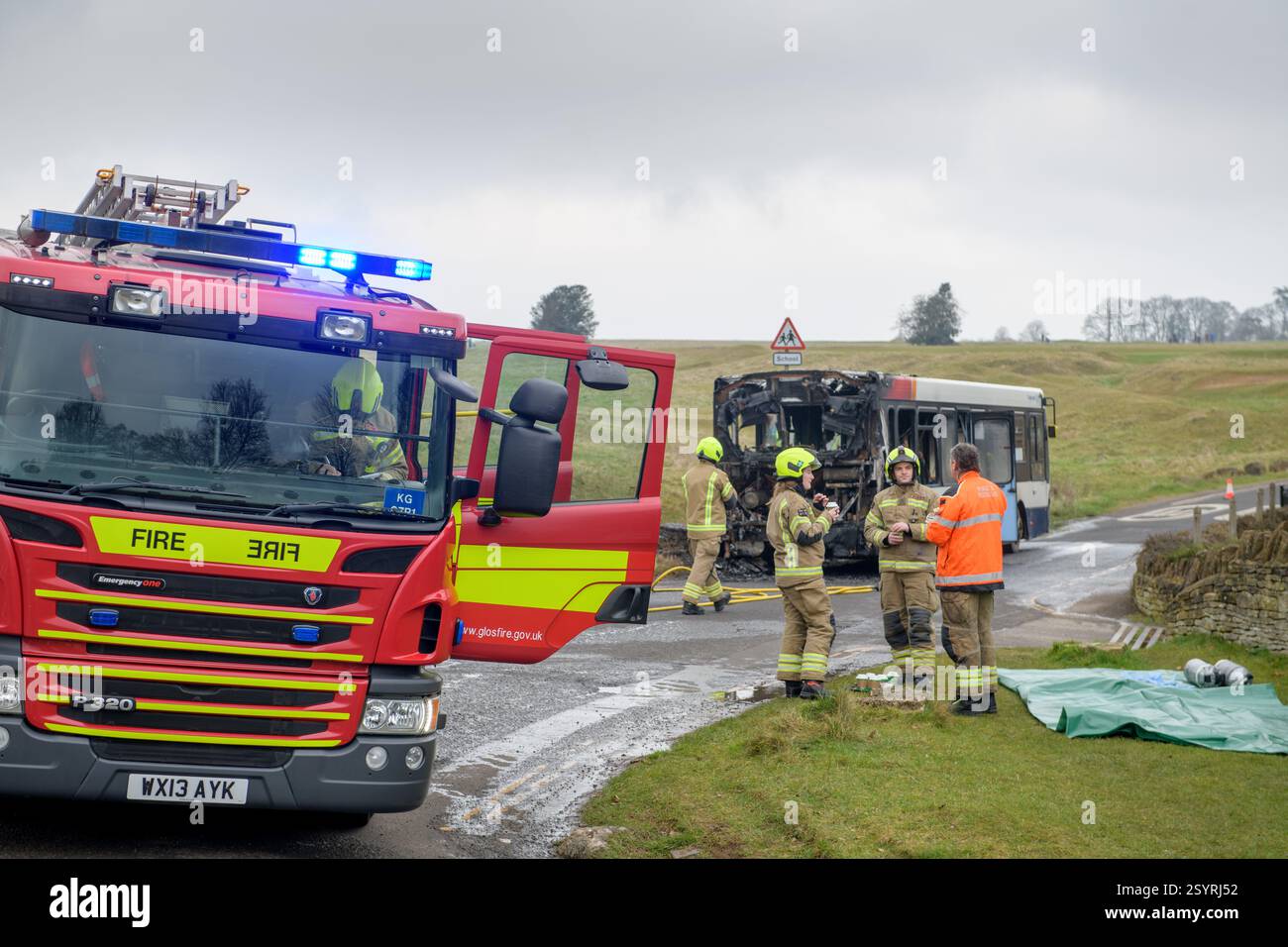 The scene after a bus fire was extinguished by firefighters on ...