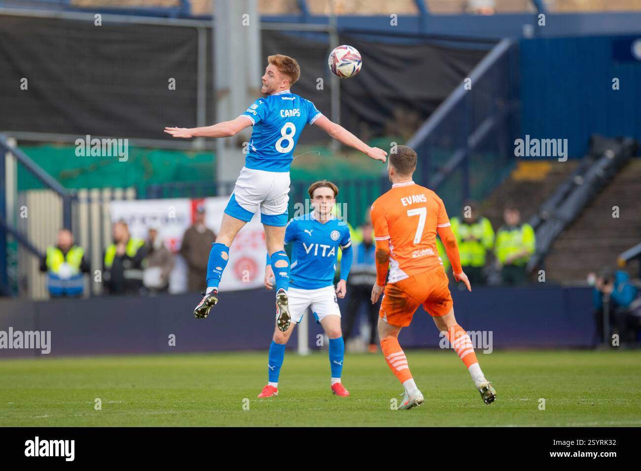 Callum Camps #8 of Stockport County F.C. heads the ball during the Sky ...