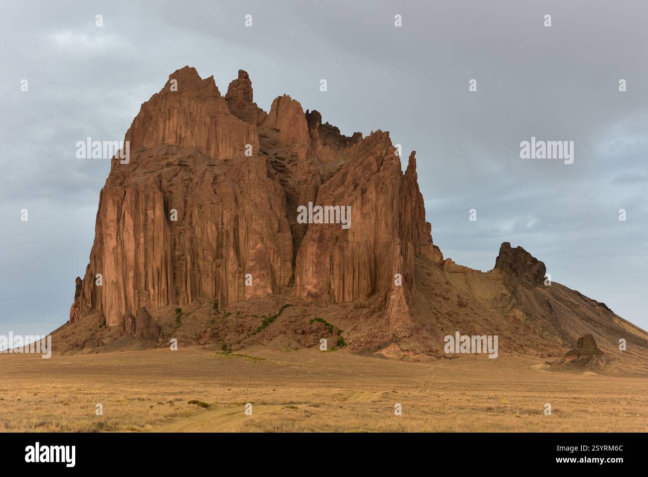 Shiprock, the great volcanic rock mountain in the desert plane of New ...