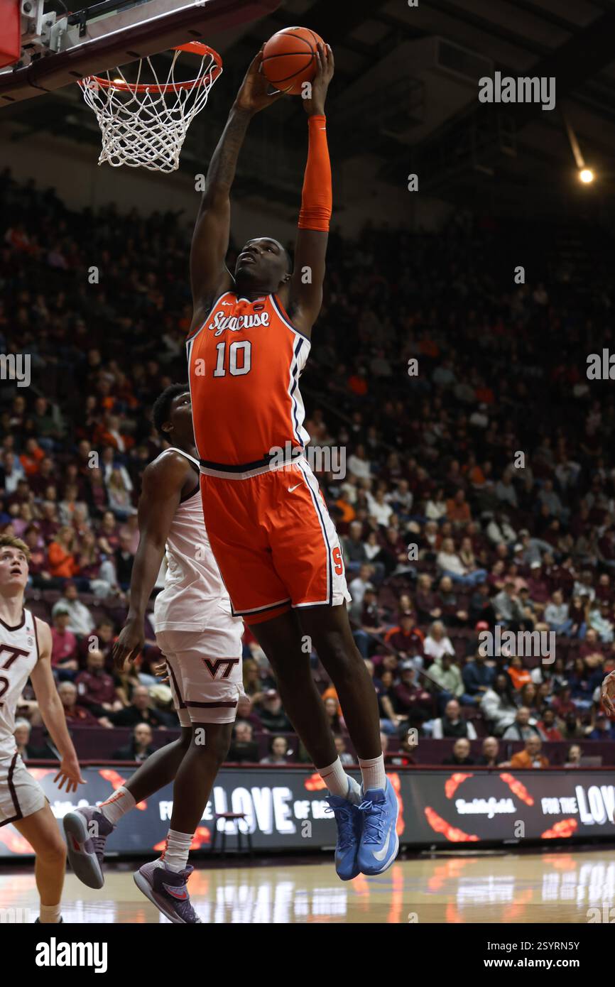 Blacksburg, VA, USA. 1st Mar, 2025. Syracuse Orange center Naheem ...