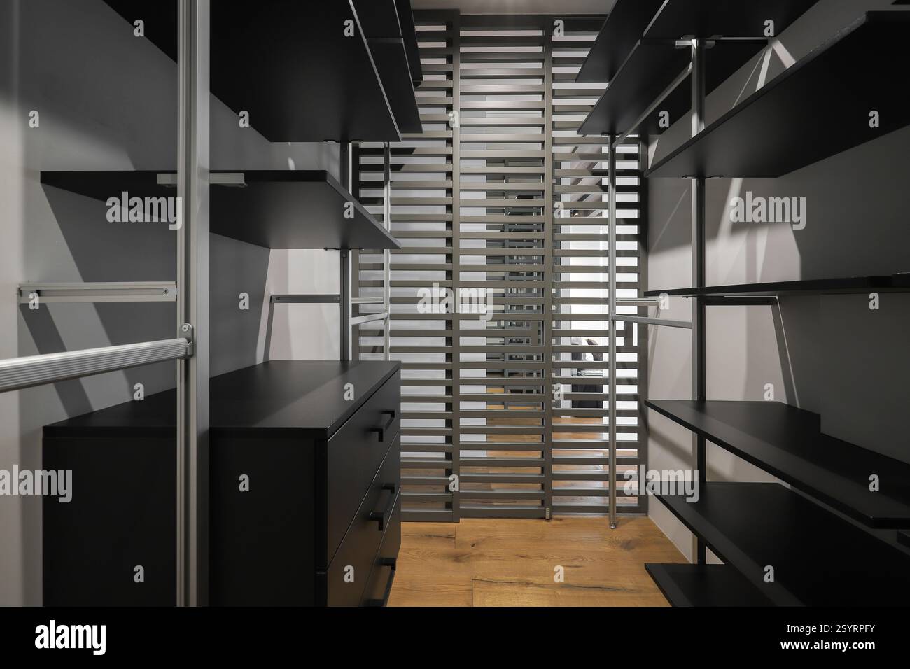 Empty wardrobe with shelves in the dressing room Stock Photo - Alamy