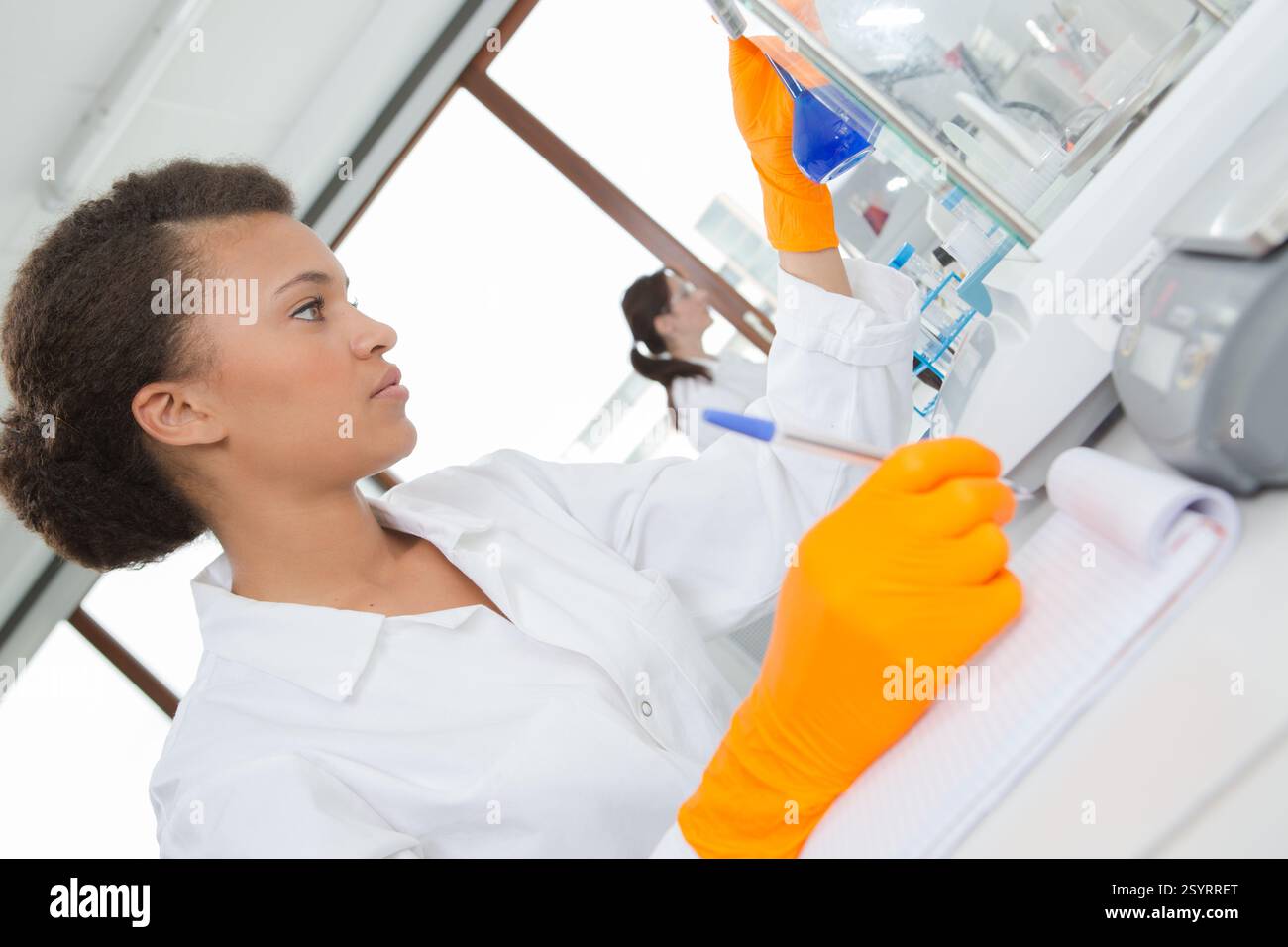 Doctor making blood analysis hi-res stock photography and images - Alamy