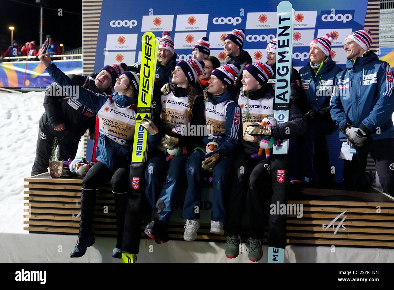 Anna Odine Stroem, foreground left, takes a selfie with her teammates ...