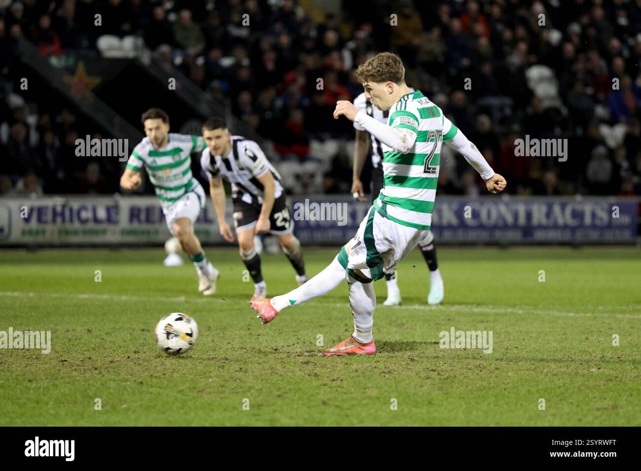 Celtic's Arne Engels scores his sides second goal from the penalty spot ...
