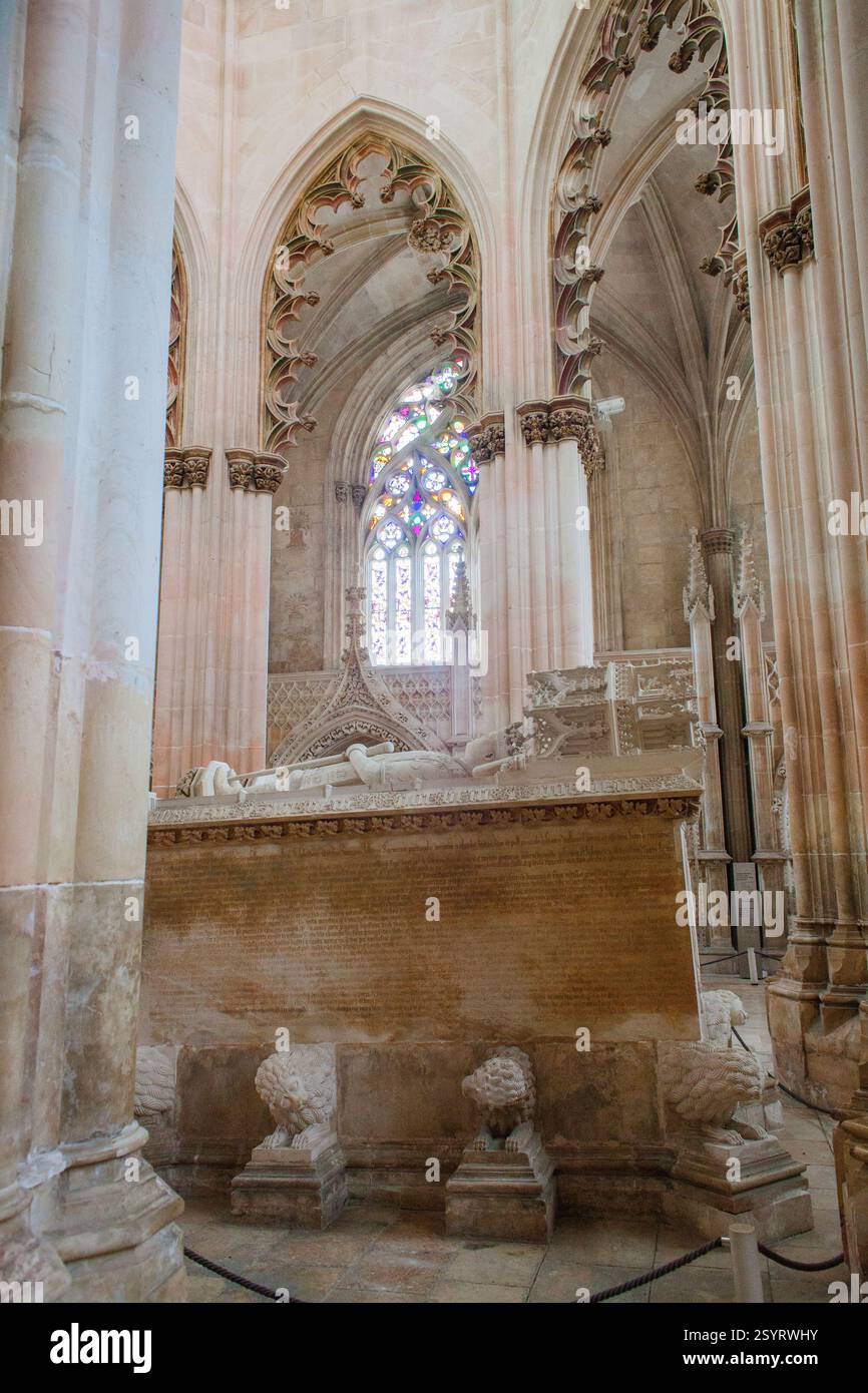 an ornate stone tomb within a historic chapel, featuring intricate ...