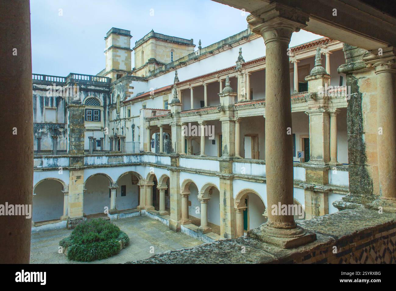 view from a cloister balcony, offering a glimpse into the intricate ...