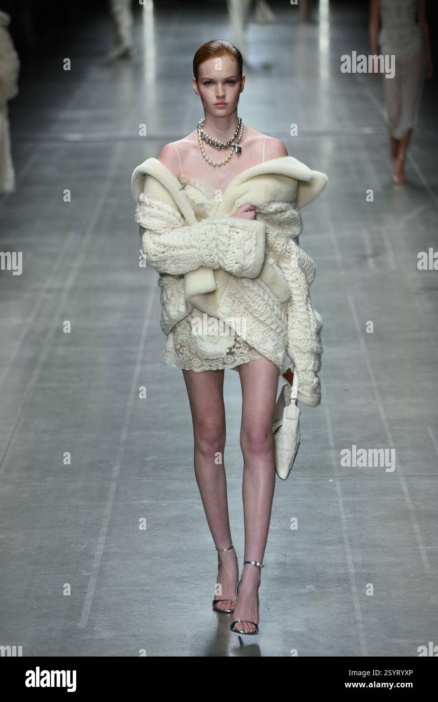 March 1, 2025, Milan, Italy: Models walk the runway during the ...