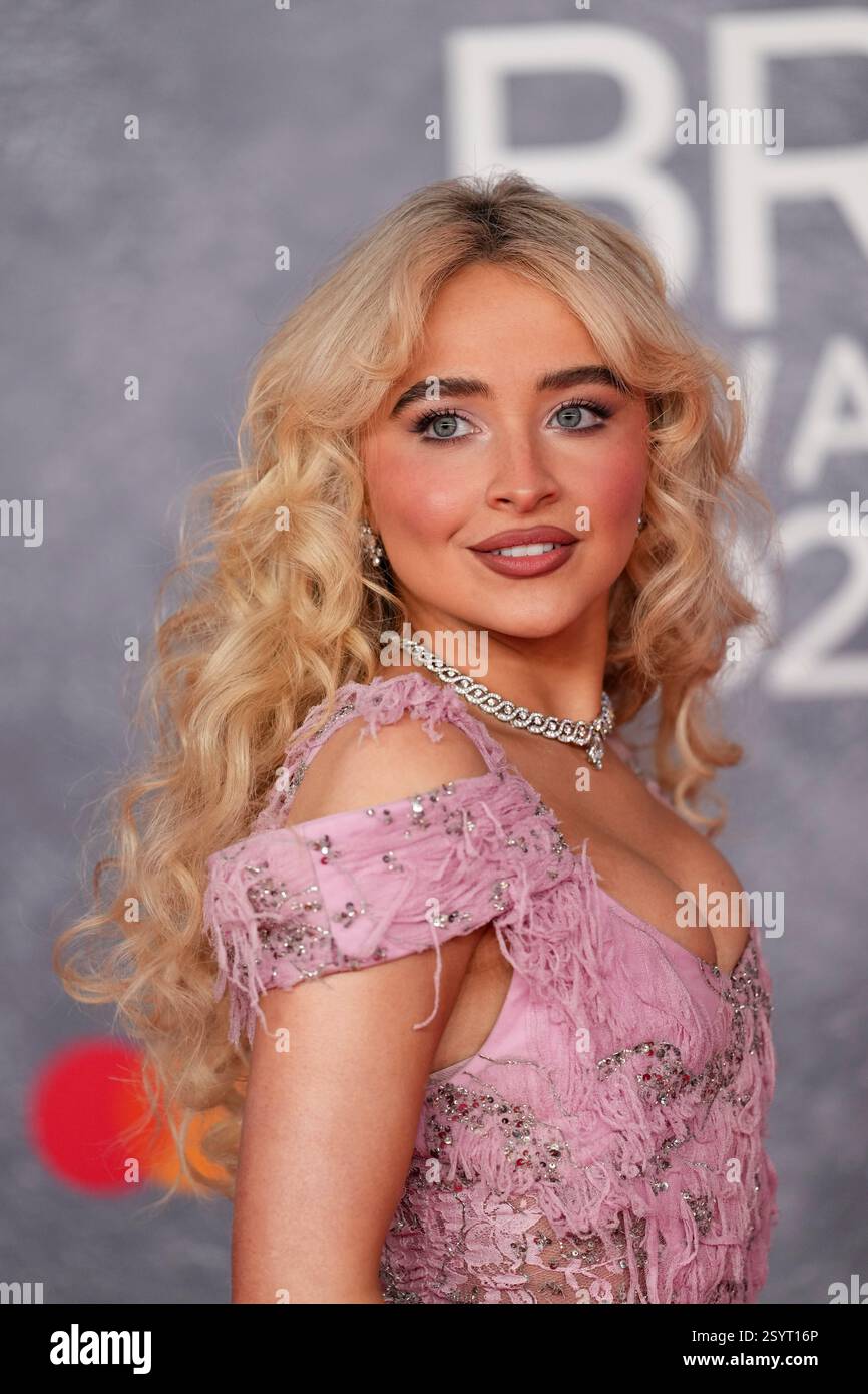 Sabrina Carpenter poses for photographers upon arrival at the Brit Awards 2025 in London ...