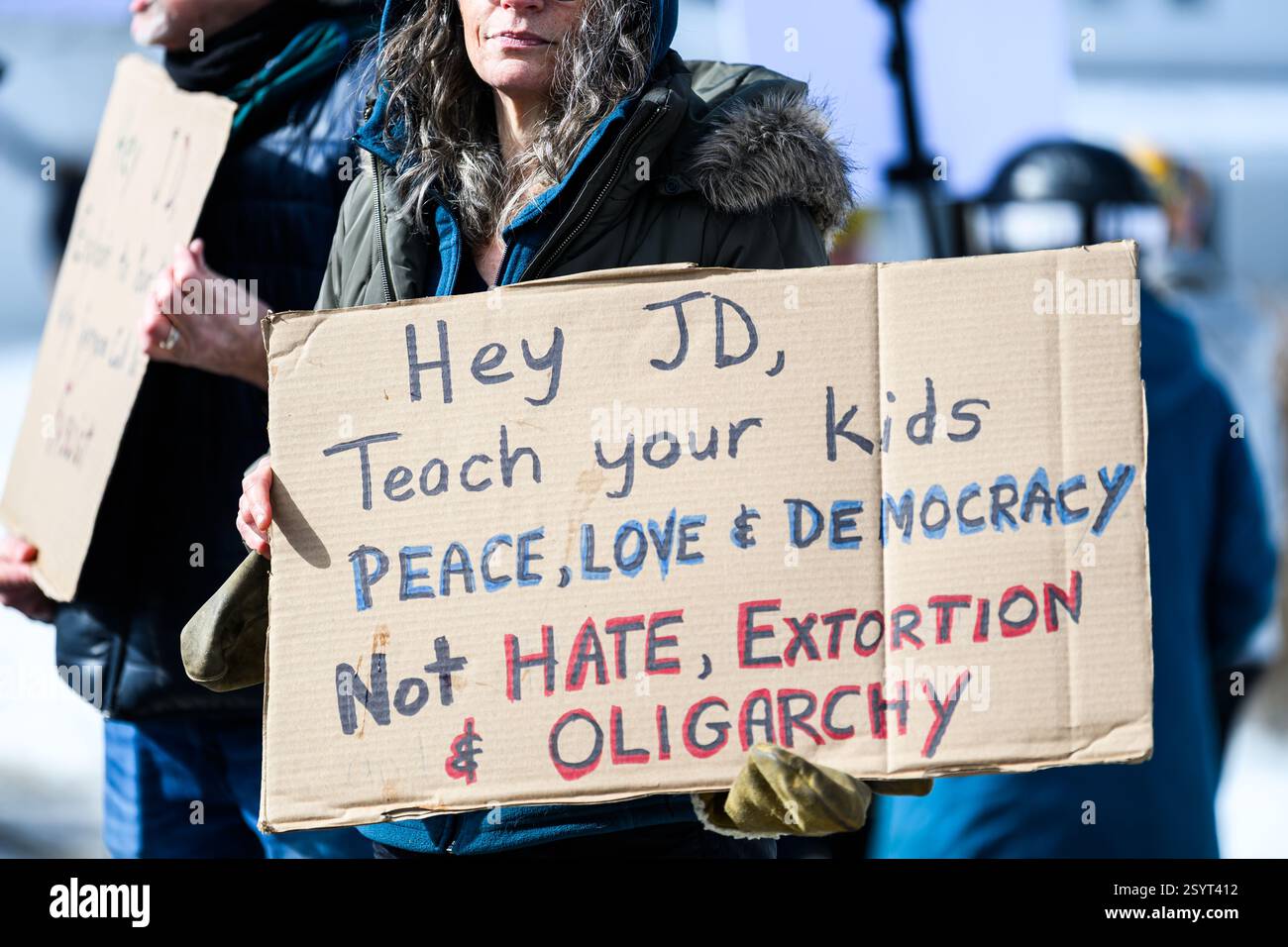 Waitsfield, Vermont, USA. 1 March 2025. Demonstrators line Route 100 in ...