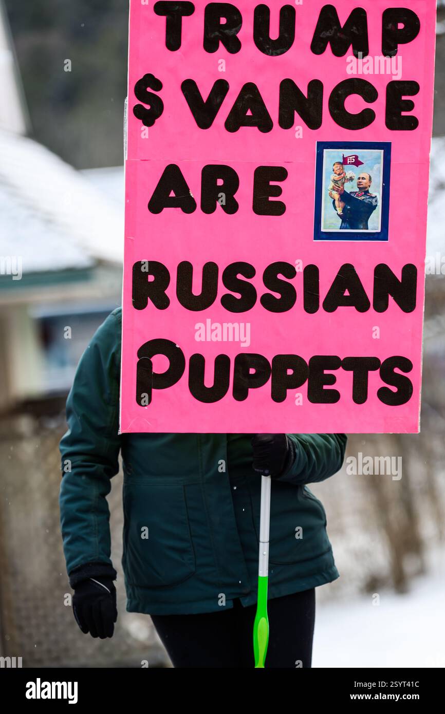 Waitsfield, Vermont, USA. 1 March 2025. Demonstrators line Route 100 in ...