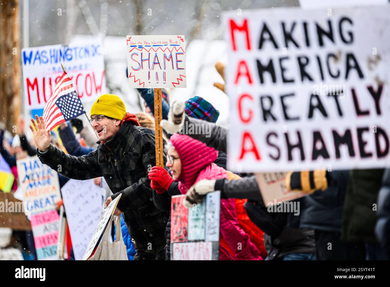 Waitsfield, Vermont, USA. 1 March 2025. Demonstrators line Route 100 in ...