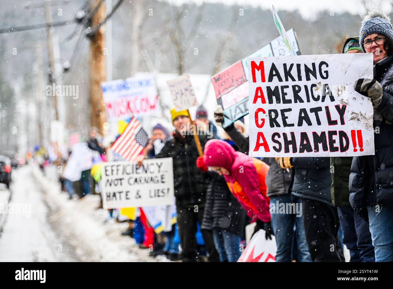 Waitsfield, Vermont, USA. 1 March 2025. Demonstrators line Route 100 in ...