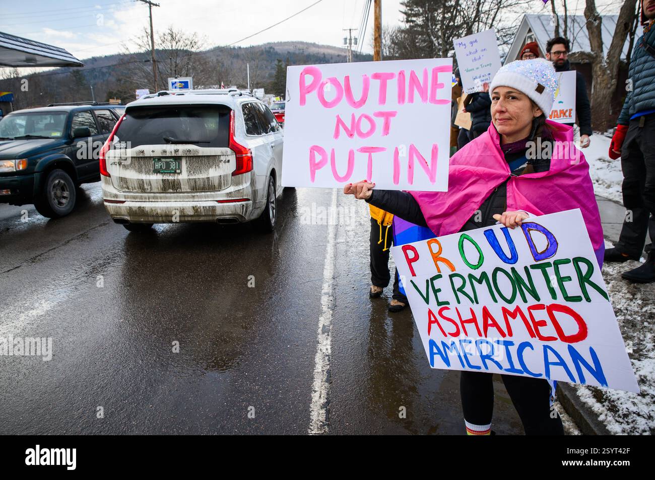 Waitsfield, Vermont, USA. 1 March 2025. Demonstrators line Route 100 in ...