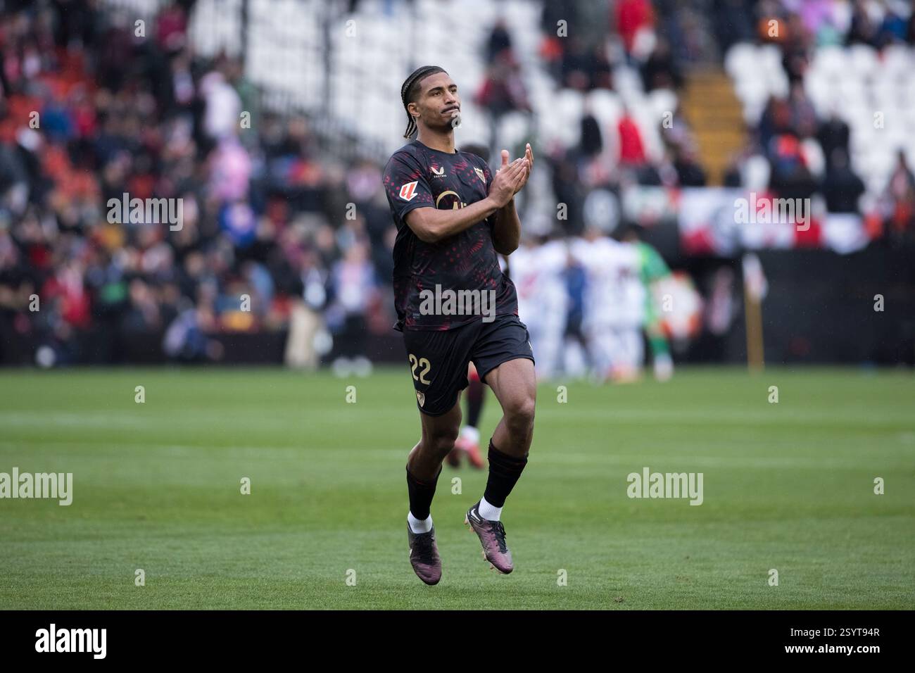 MADRID, SPAIN - March1: Loic Bade of Sevilla greet fans during the ...