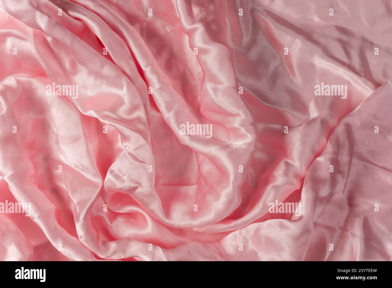 Purple / pink wrinkled fabric background Stock Photo - Alamy