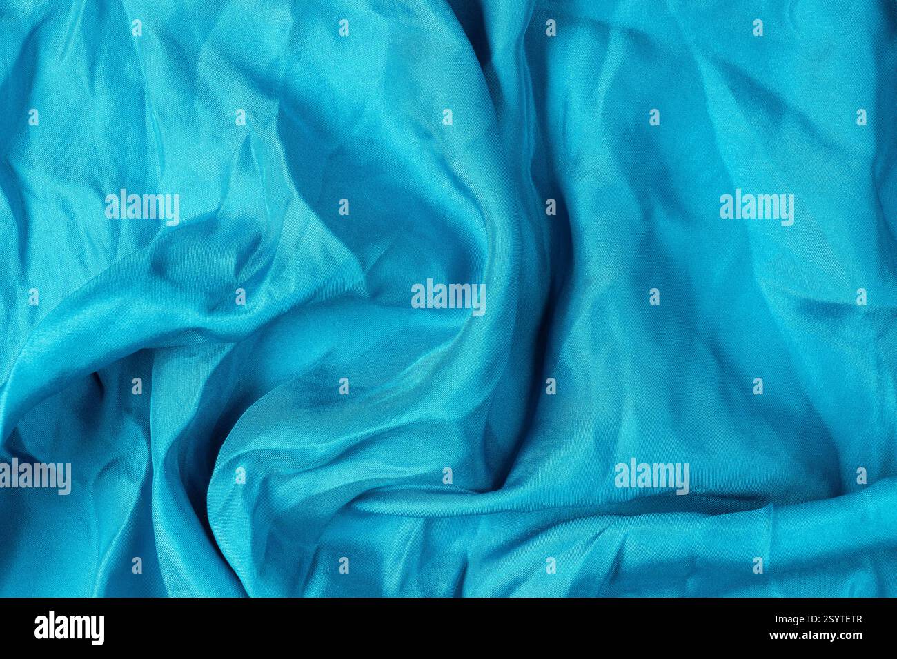 Green / turqois color silky fabric background Stock Photo - Alamy