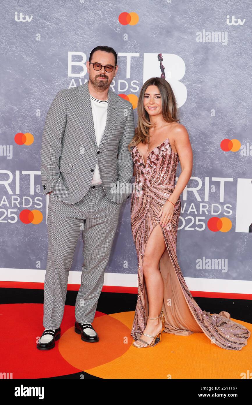 Danny Dyer (left) and Dani Dyer arriving for The BRIT Awards 2025 at London's O2 Arena. Picture ...