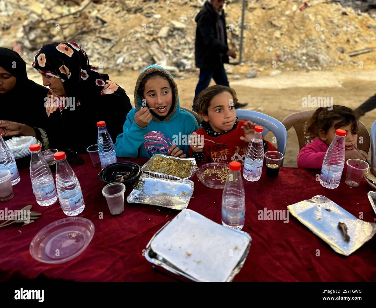 Palestinians break their fast by eating the Iftar meals during the holy ...