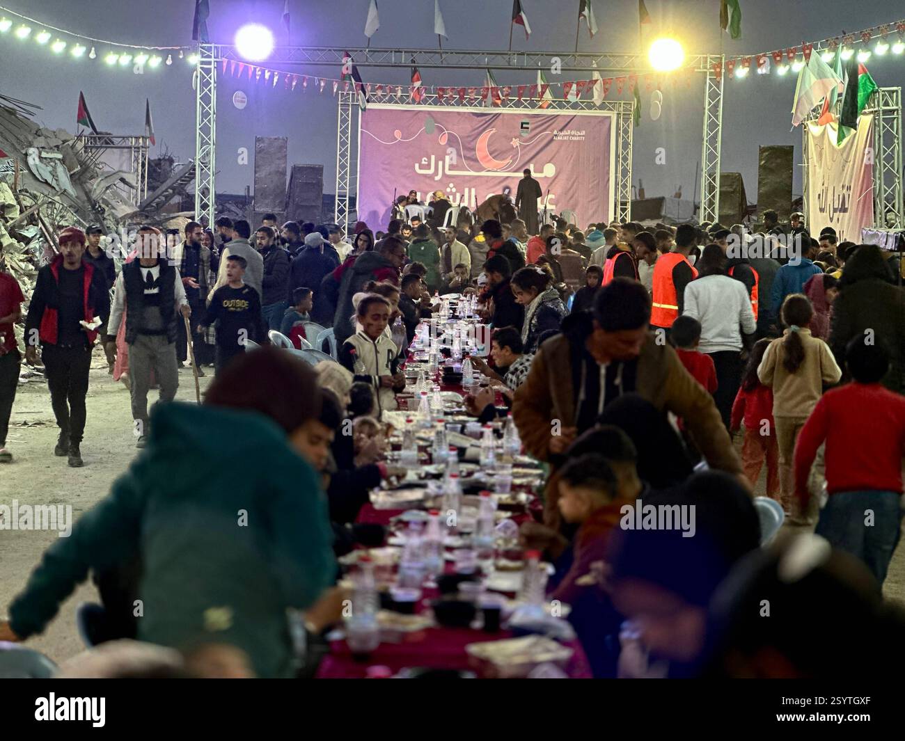 Palestinians break their fast by eating the Iftar meals during the holy ...