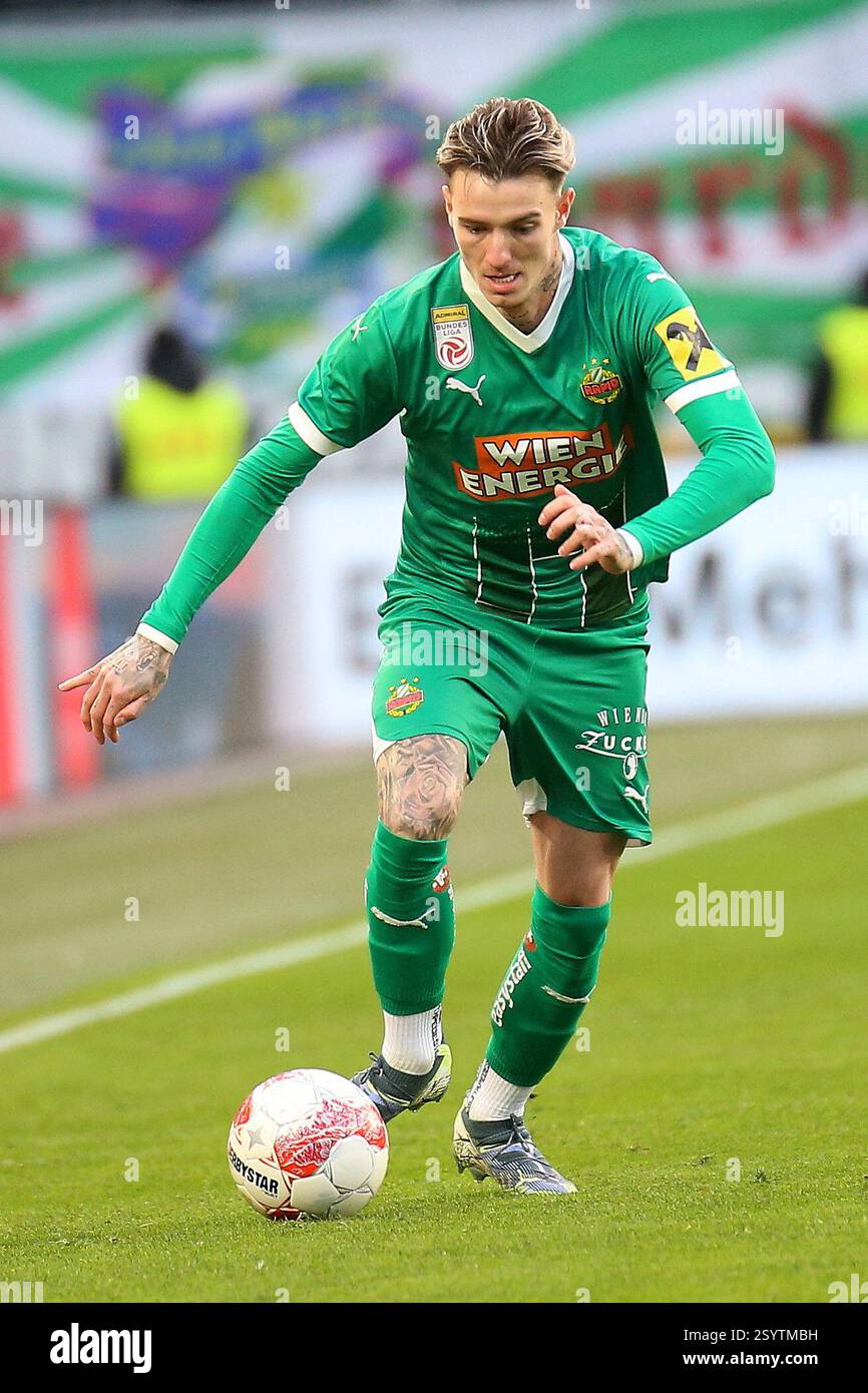 VIENNA, AUSTRIA - MARCH 01: Bendeguz Bolla of Rapid have the ball ...