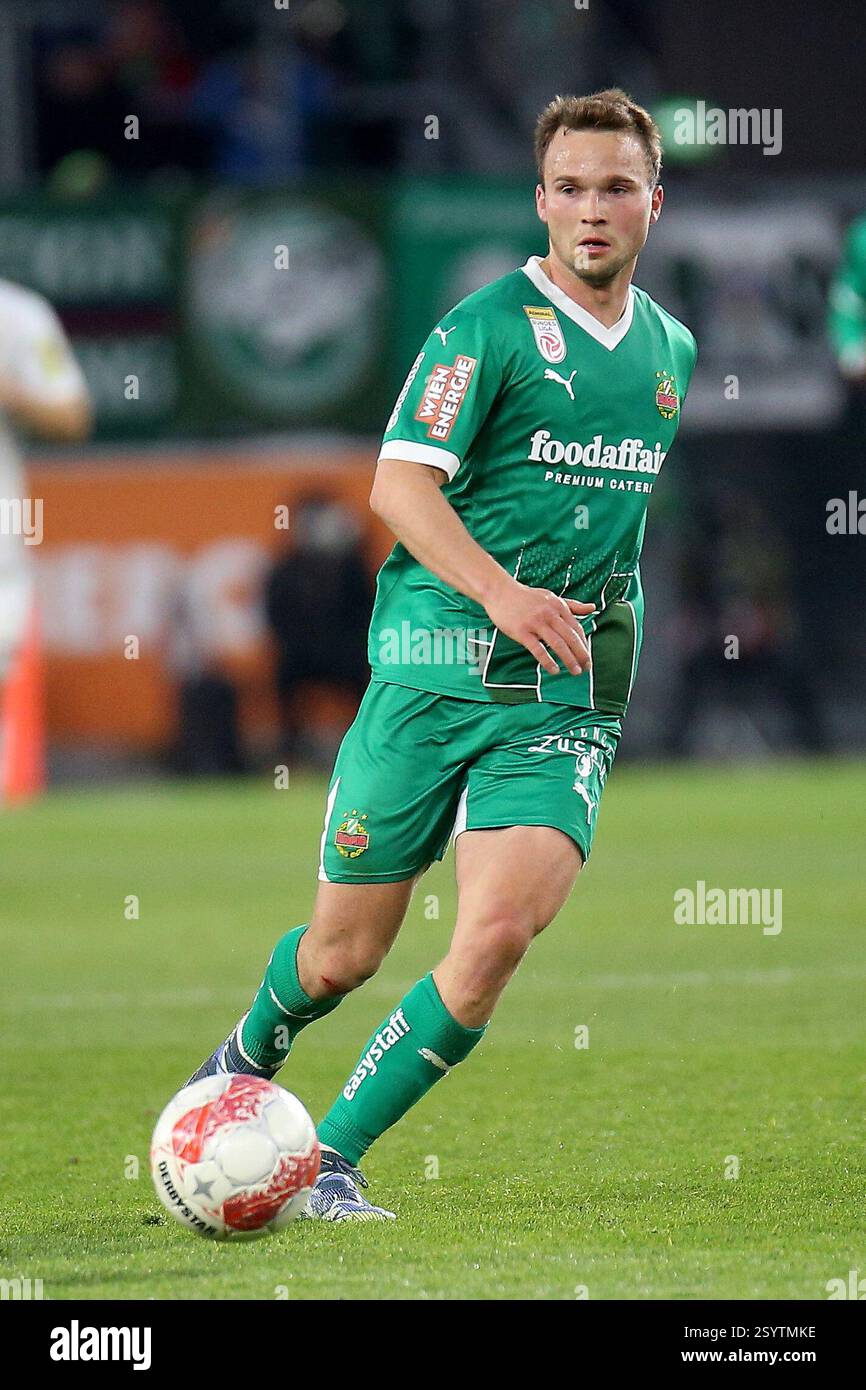 VIENNA, AUSTRIA - MARCH 01: Matthias Seidl of Rapid have the ball ...