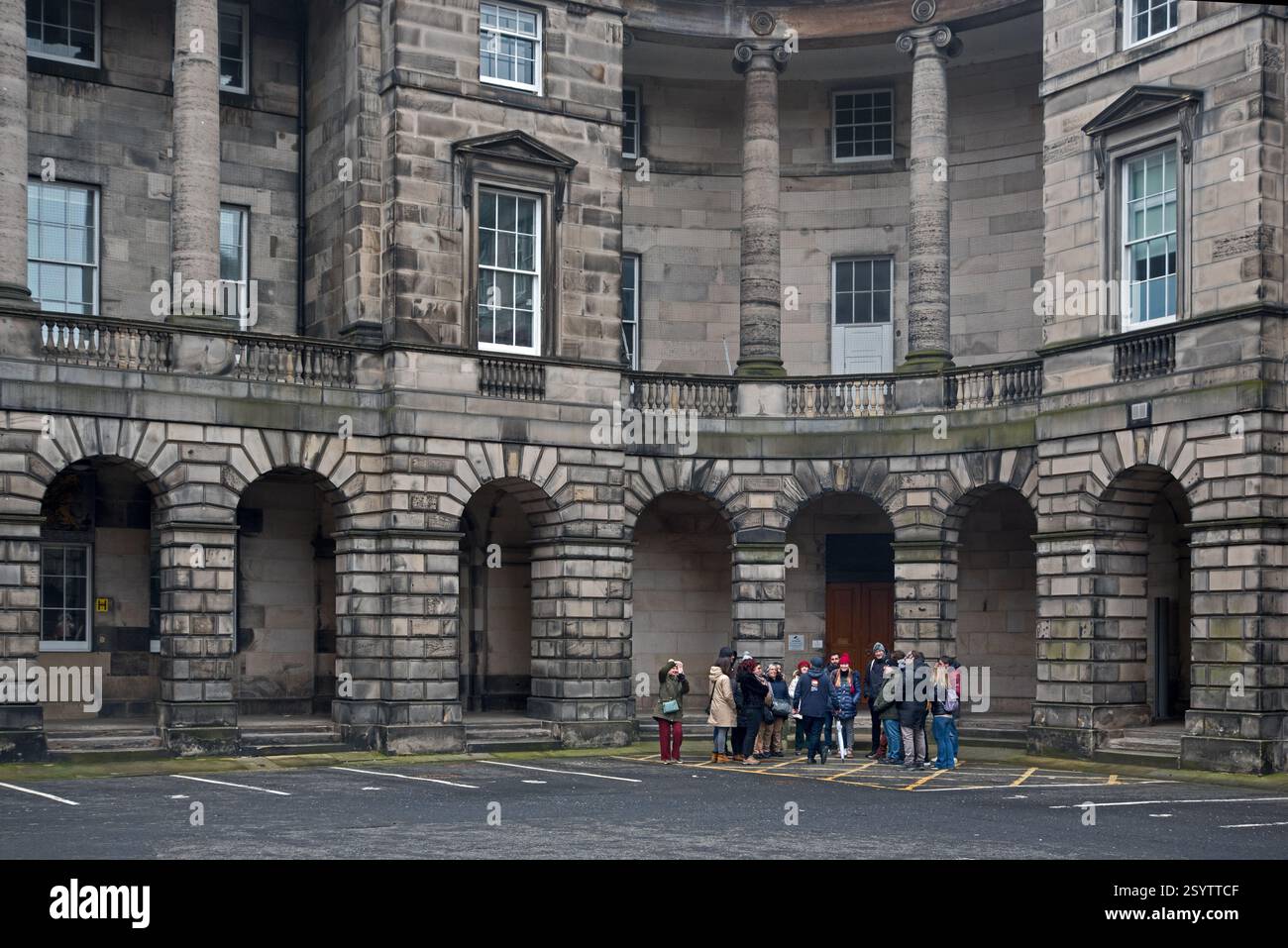 Walking tour standing in Parliament Square in Edinburgh's Old Town ...