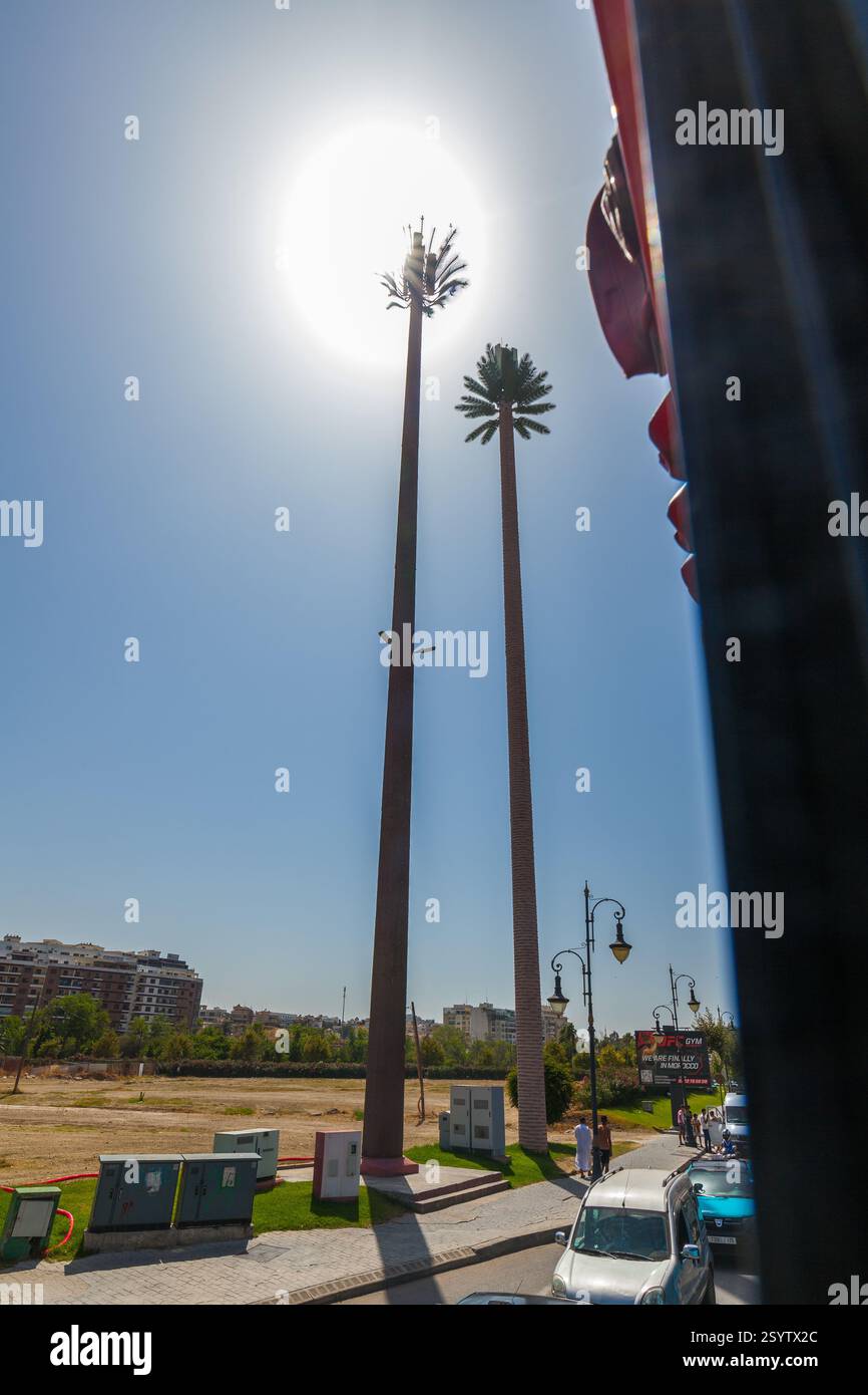 clever urban design solution, with two tall cellular towers disguised ...