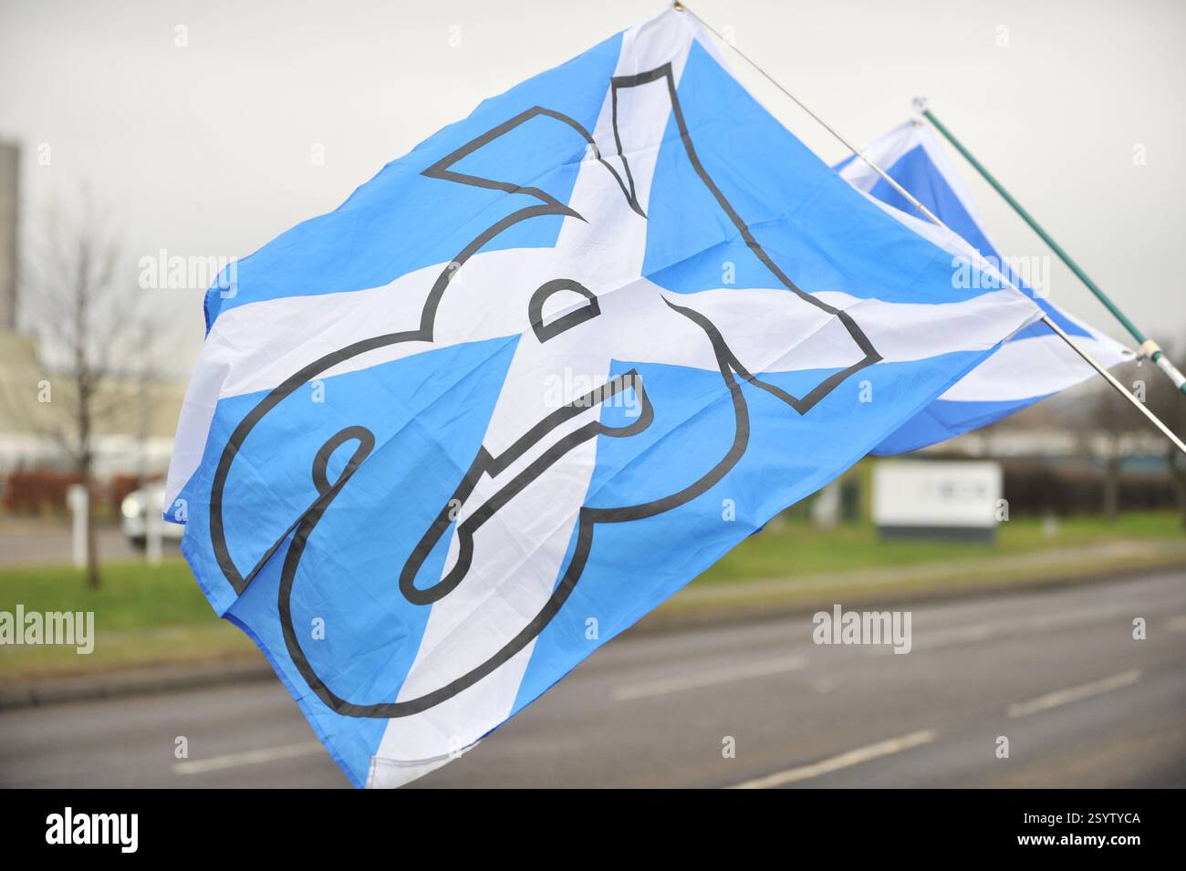 Grangemouth, UK. 1st March, 2025 - Two flags are seen flying during the ...