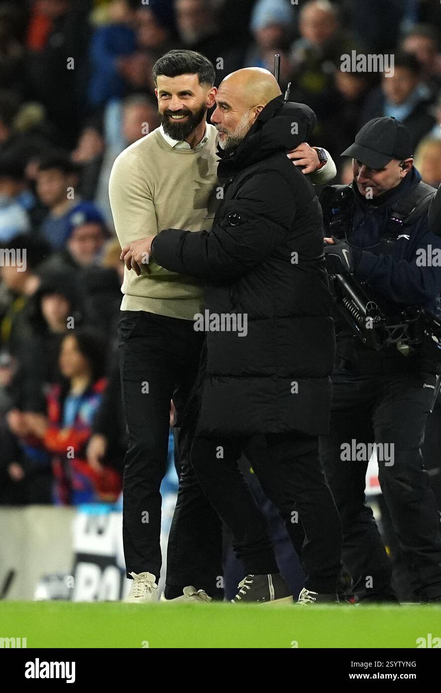 Plymouth Argyle manager Miron Muslic (left) and Manchester City manager ...