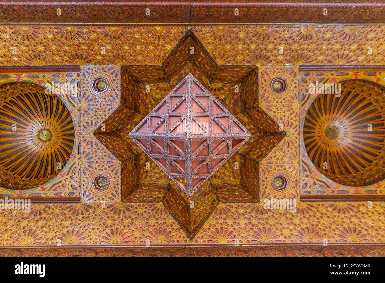 breathtaking ceiling adorned with intricate geometric patterns and a ...