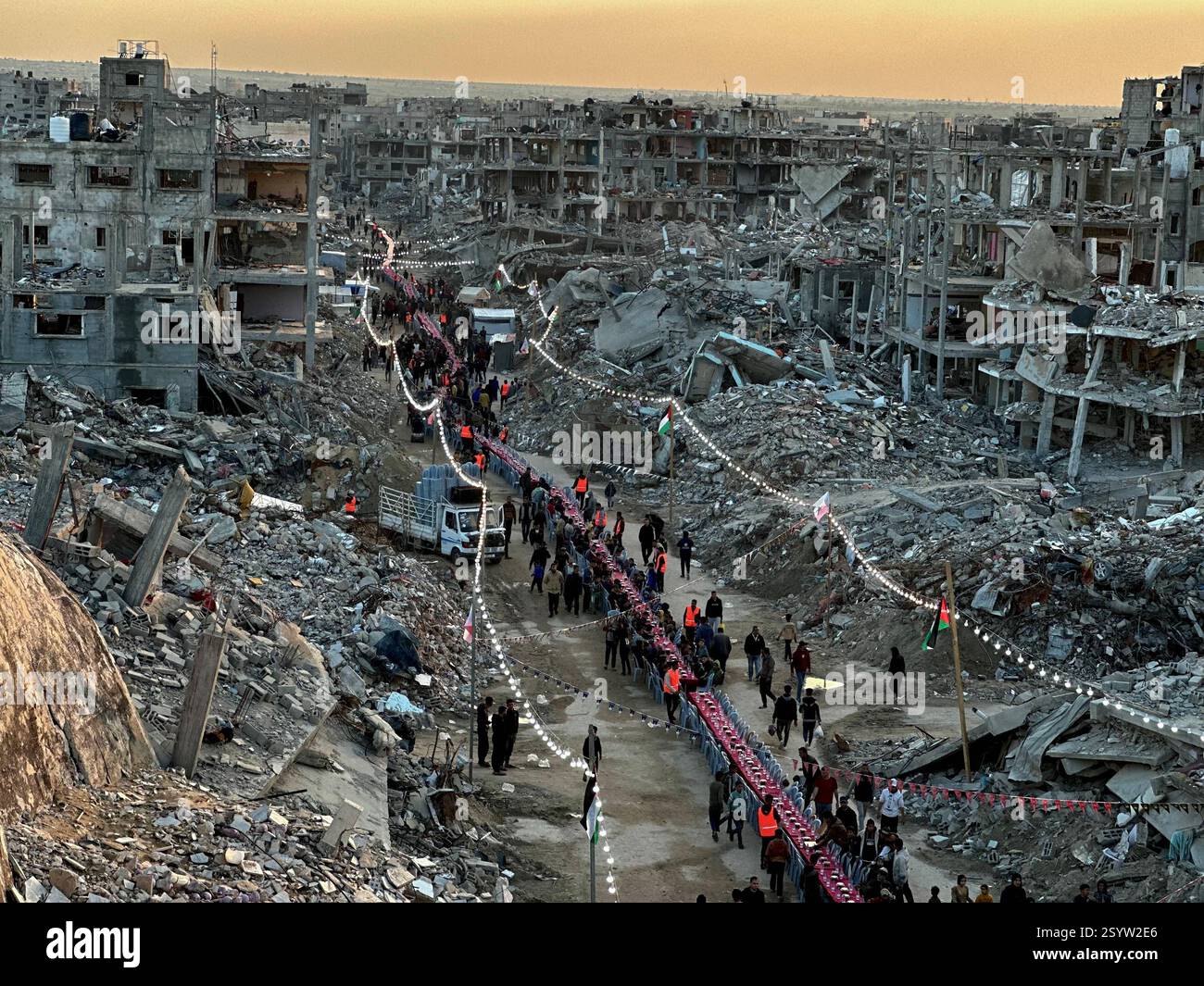 Palestinians break their fast by eating the Iftar meals during the holy ...