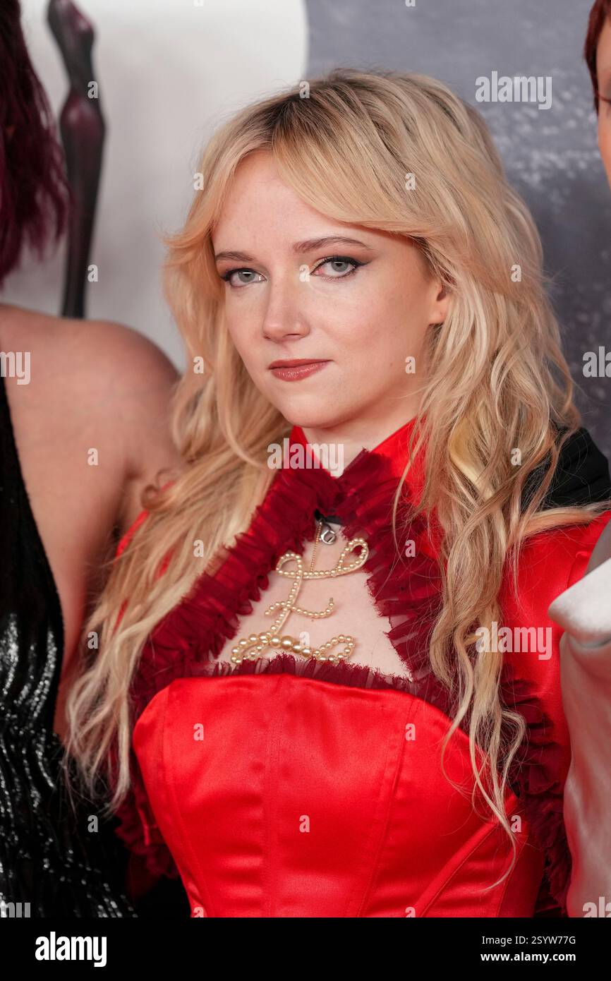 Emily Roberts poses for photographers upon arrival at the Brit Awards ...
